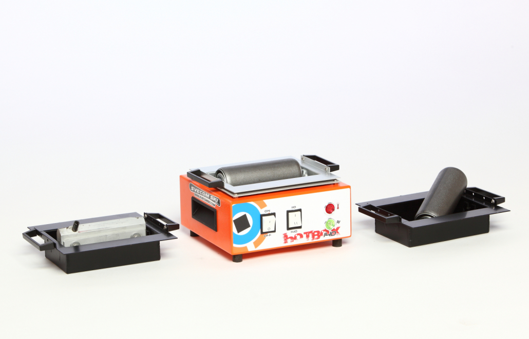 Manual hot waxing machine for skis and snowboards. | Svecom SKI